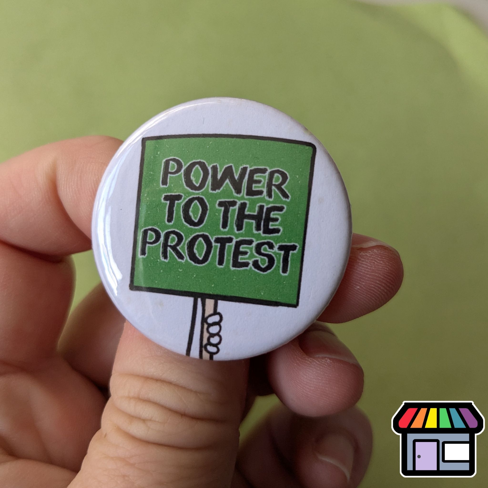 Power To The Protest Badge – Queer Little Shop